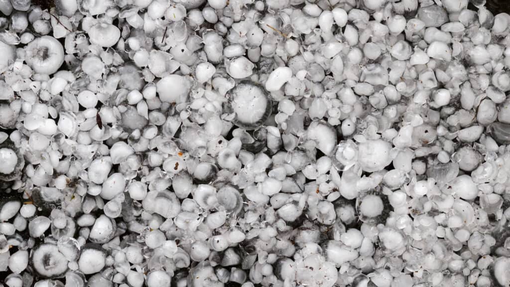 What Size Hail Will Damage Your Roof? (And How To Spot Damage)